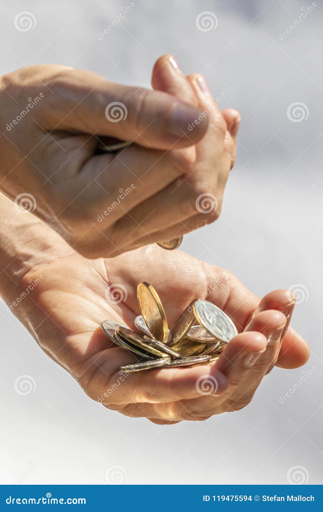 A Hand Holding and Dropping Coins Editorial Stock Image - Image of ...