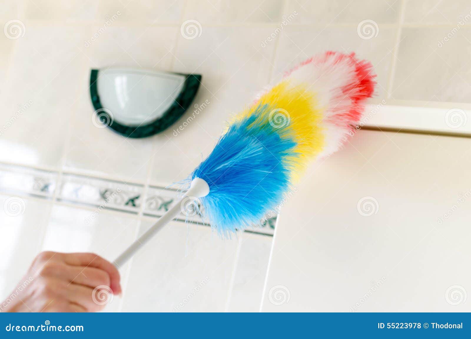 Hand Holding a Duster Clean Stock Photo - Image of housework, colorful ...