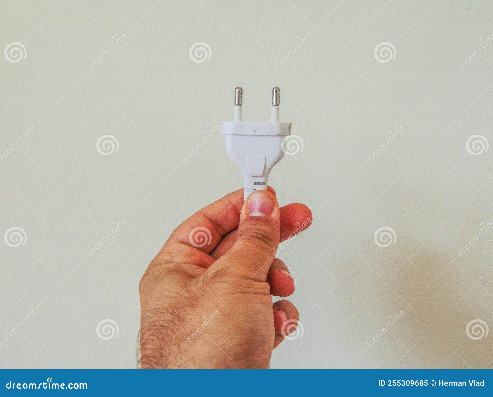 A Hand is Holding an Electric Plug. Energy Concept Stock Image - Image ...