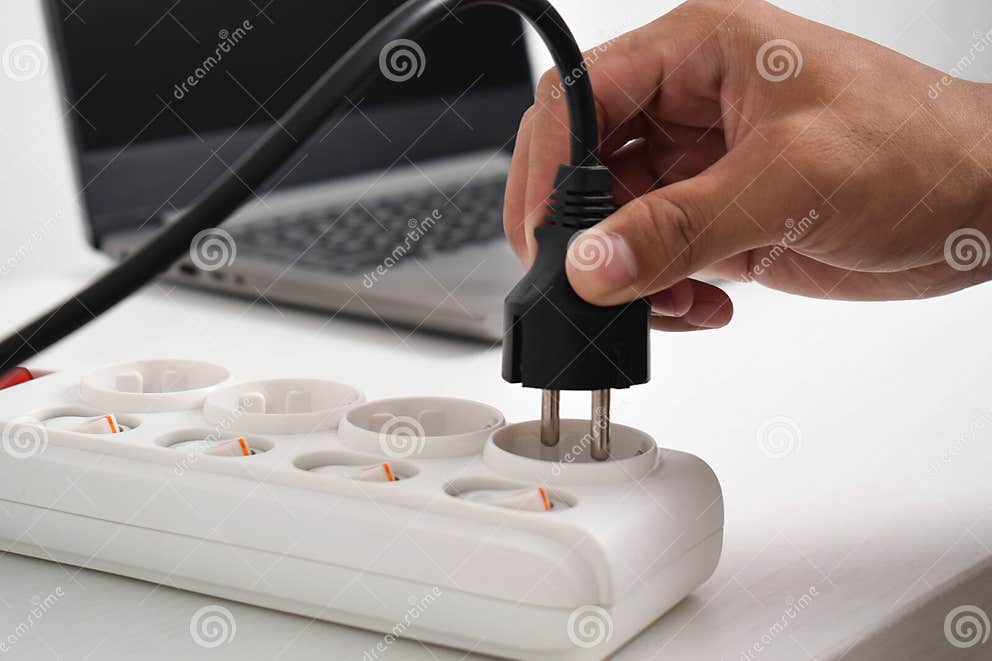 Hand Holding Electric Plug, Multiple Socket with Connected Plugs Stock ... Hand Holding Electric Plug, Multiple Socket with Connected Plugs Stock ...