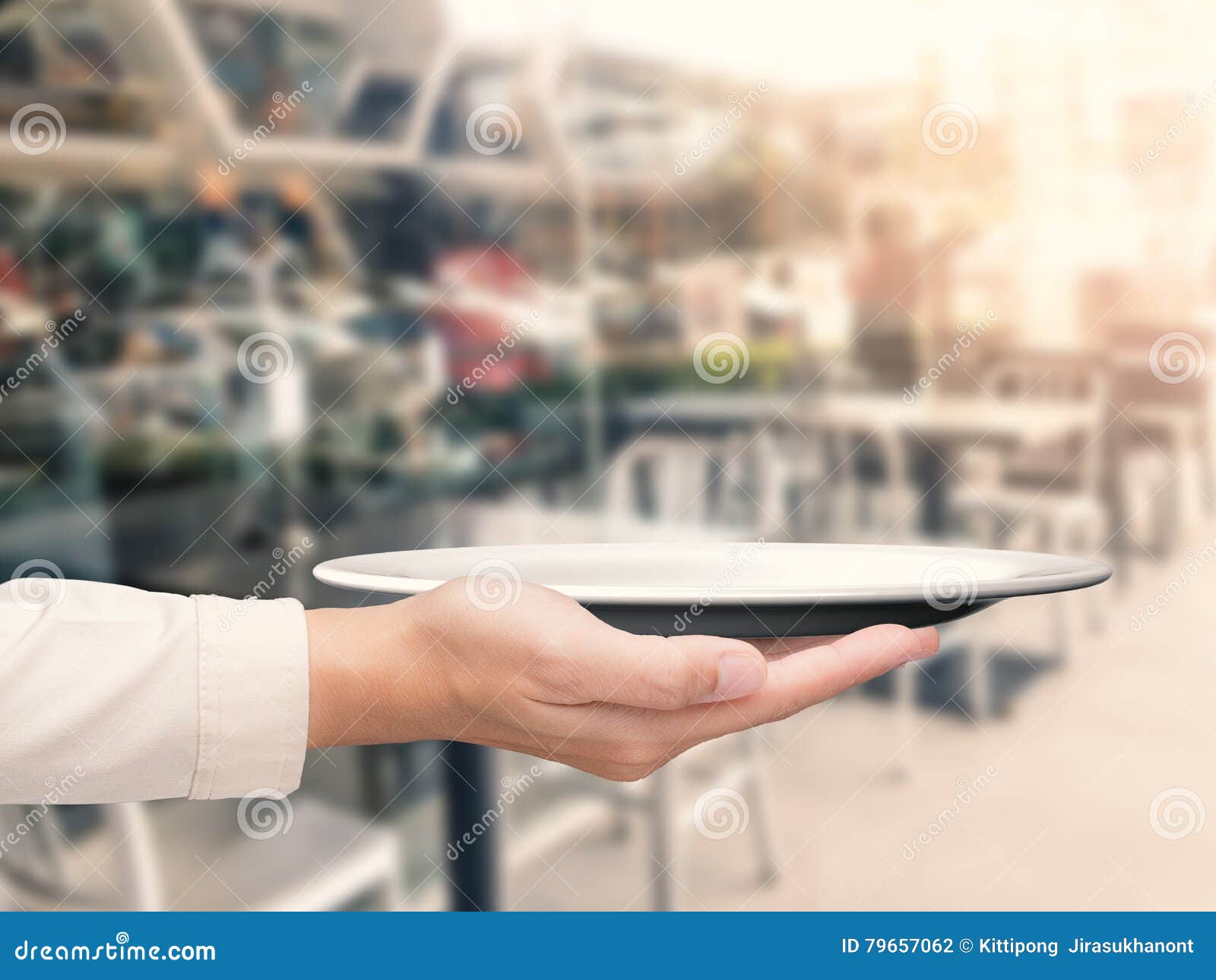 Hand holding empty dish stock photo. Image of offering - 79657062