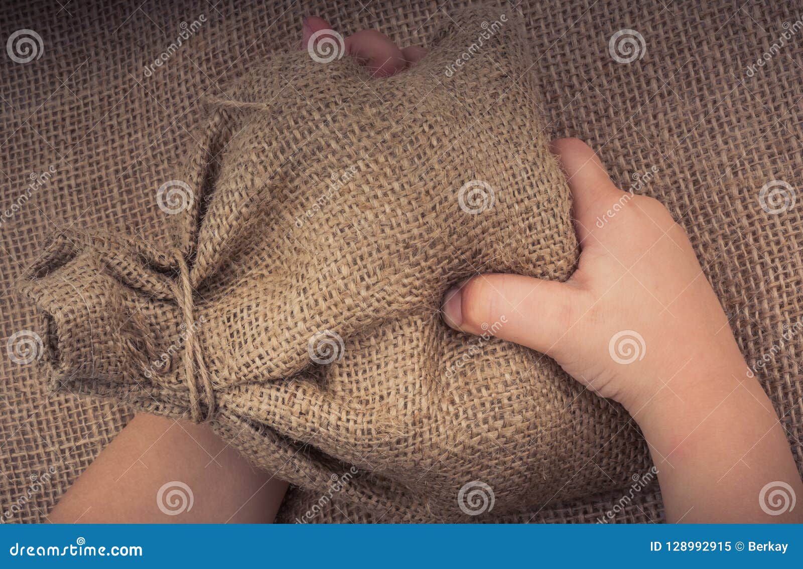 Hand Holding Empty Little Sack Made of Linen Stock Image - Image of ...