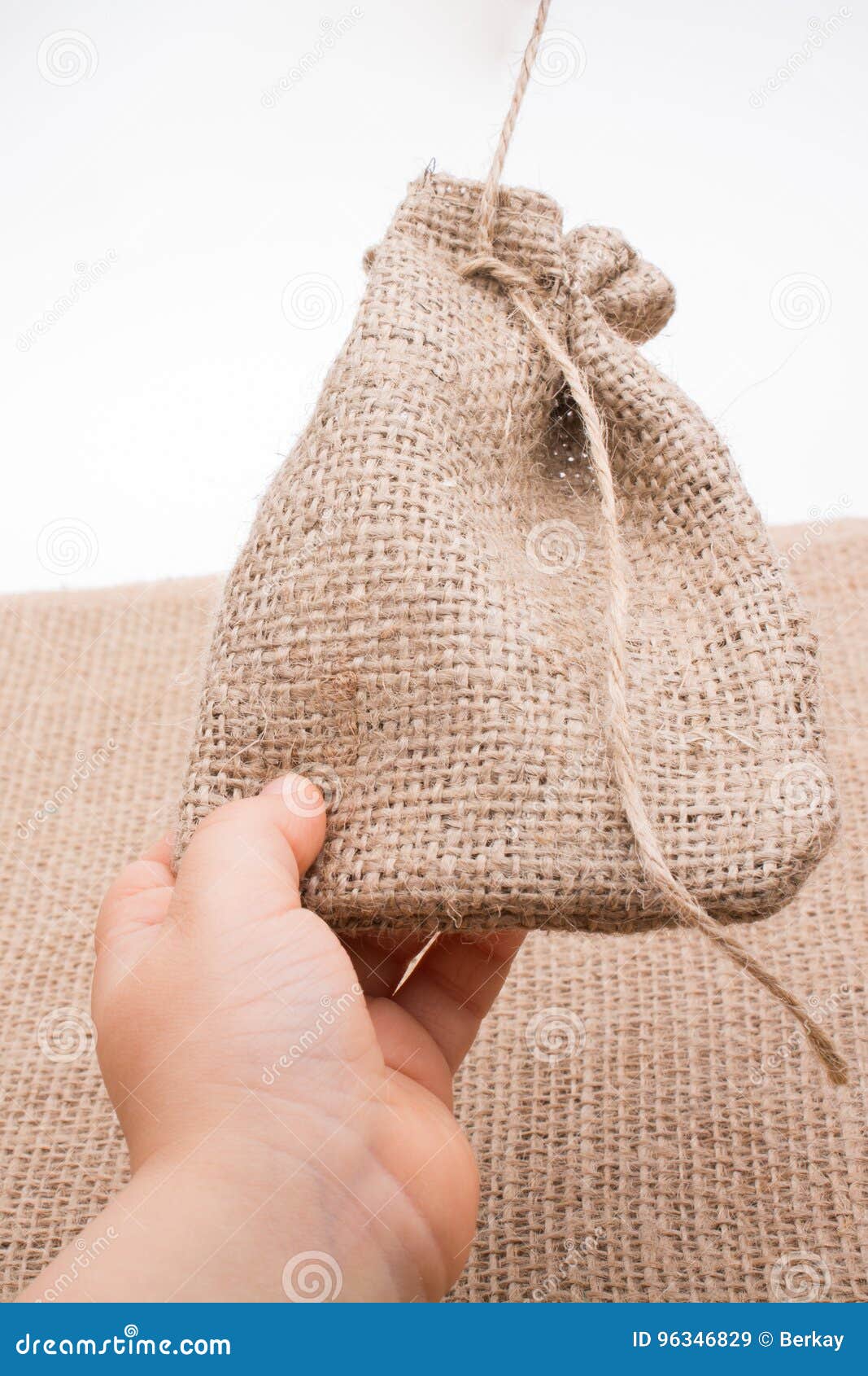 Hand Holding Empty Little Sack Made of Linen Stock Image - Image of ...