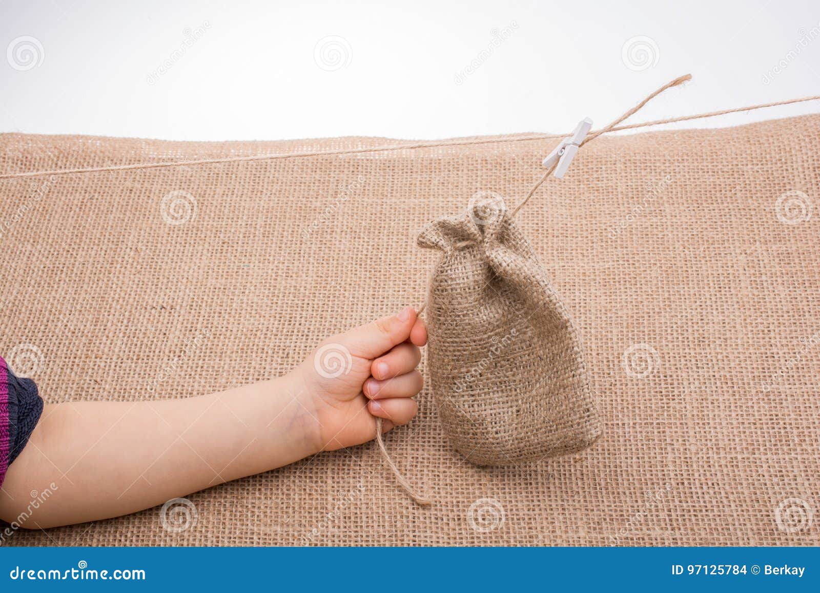 Hand Holding Empty Little Sack Made of Linen Stock Photo - Image of ...