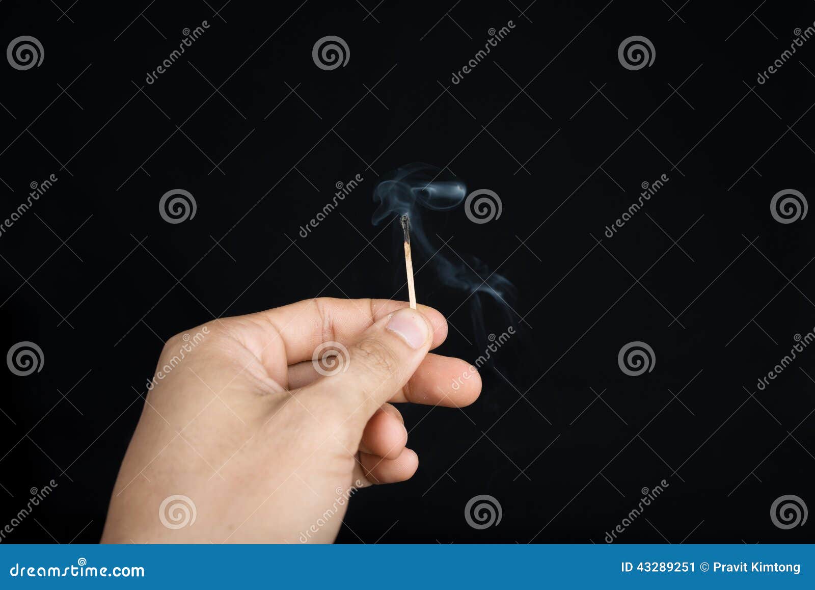 Hand Holding an Extinguished Matchstick on Black Background Stock Image ...