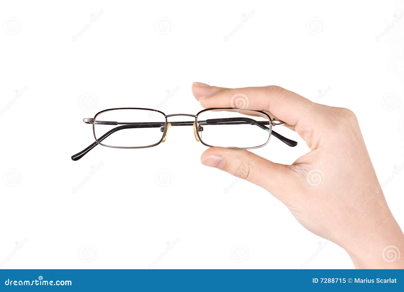 Hand holding eyeglasses stock image. Image of glasses - 7288715