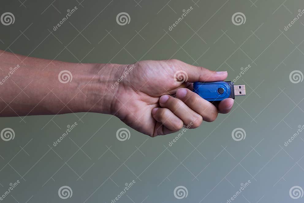 Hand holding flash drive stock photo. Image of hand, business - 47918142