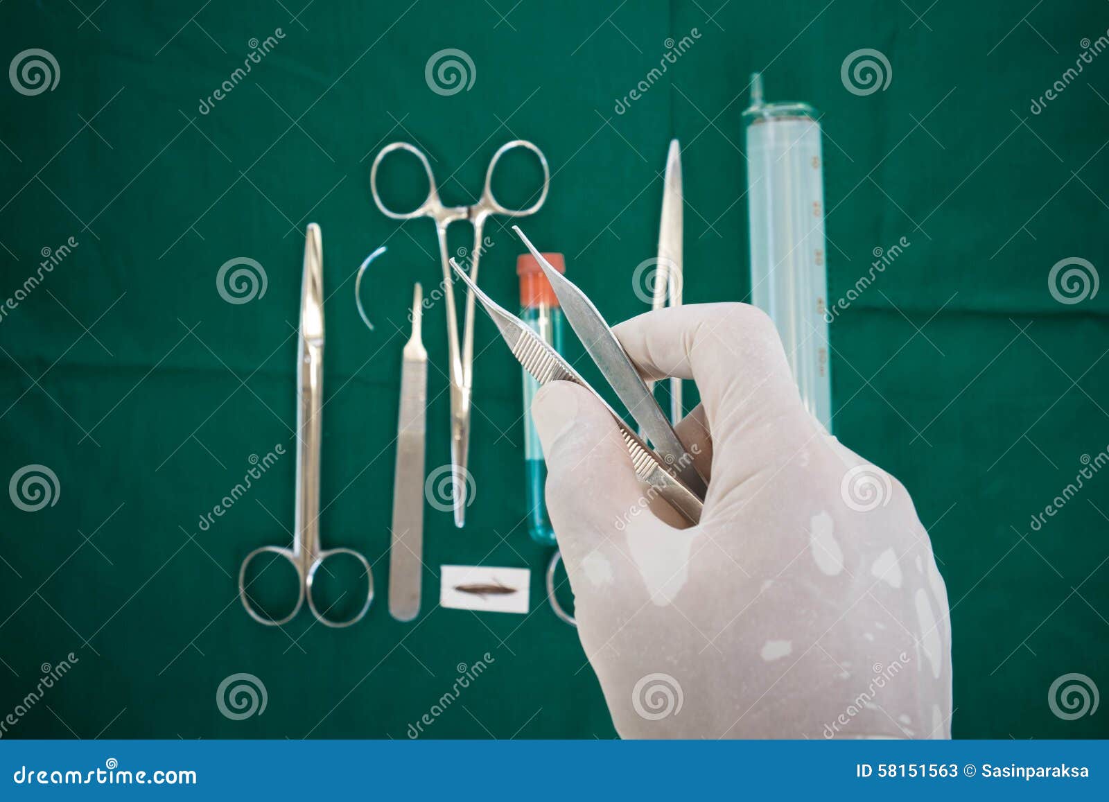 Hand Holding Forceps, with Instruments for Surgery Background Stock ...