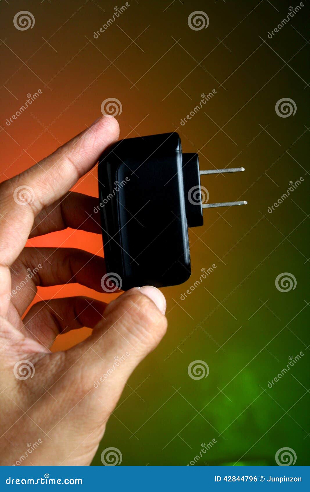 Hand Holding a Gadget Charger Stock Photo - Image of laptop, gadget ...