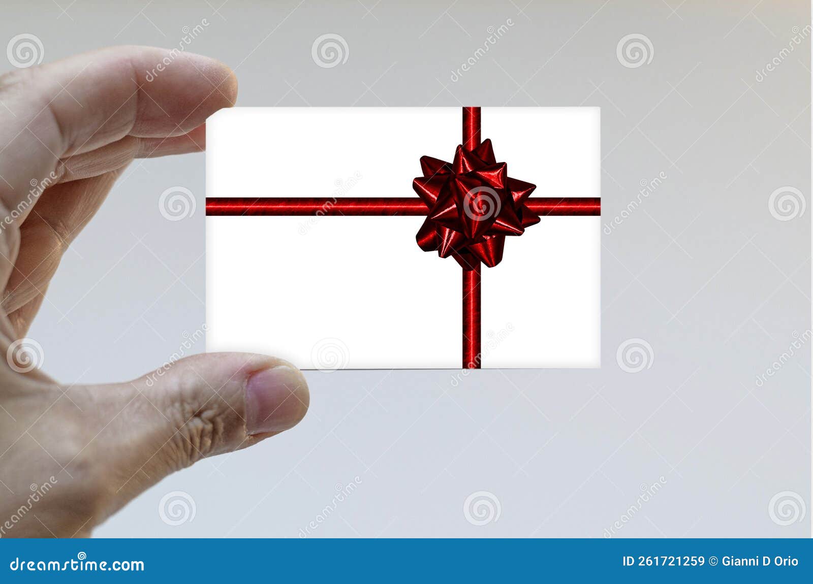 Hand holding a gift card stock image. Image of discount - 261721259