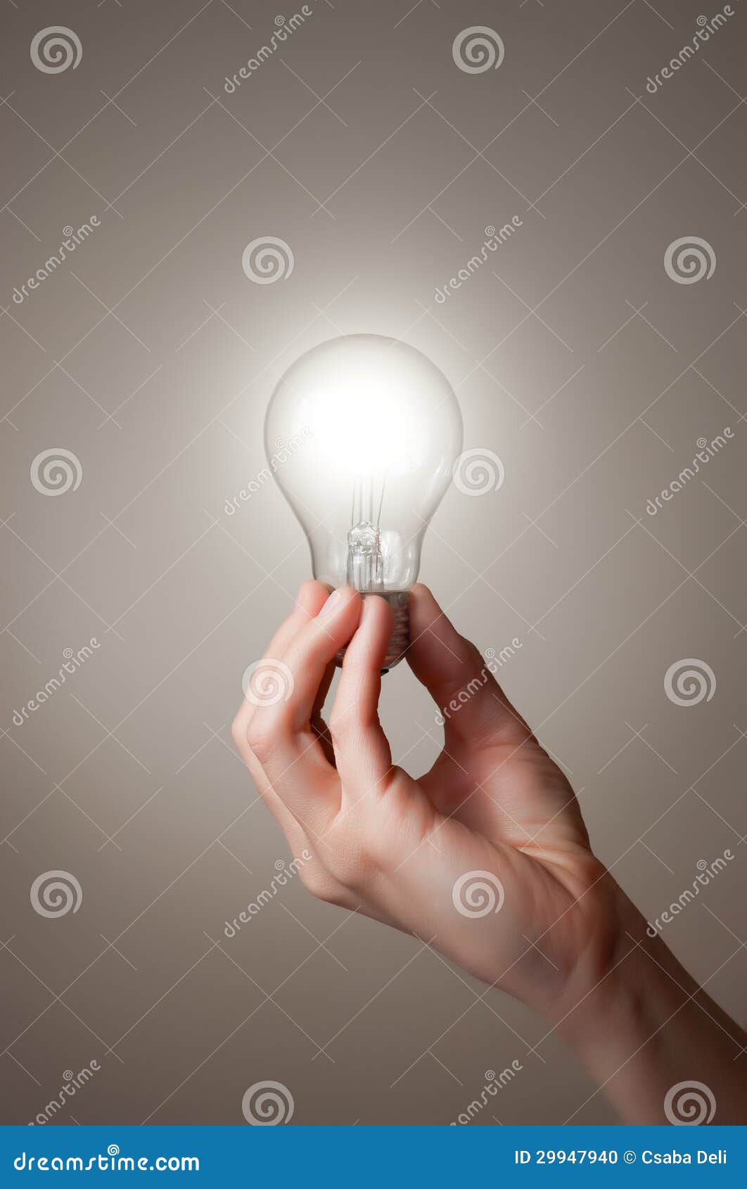 Hand with light bulb stock photo. Image of business, human - 29947940