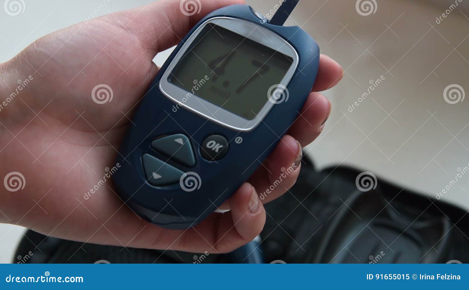 Hand Holding Glucometer Displaying Normal Blood Sugar Range Stock Video ...
