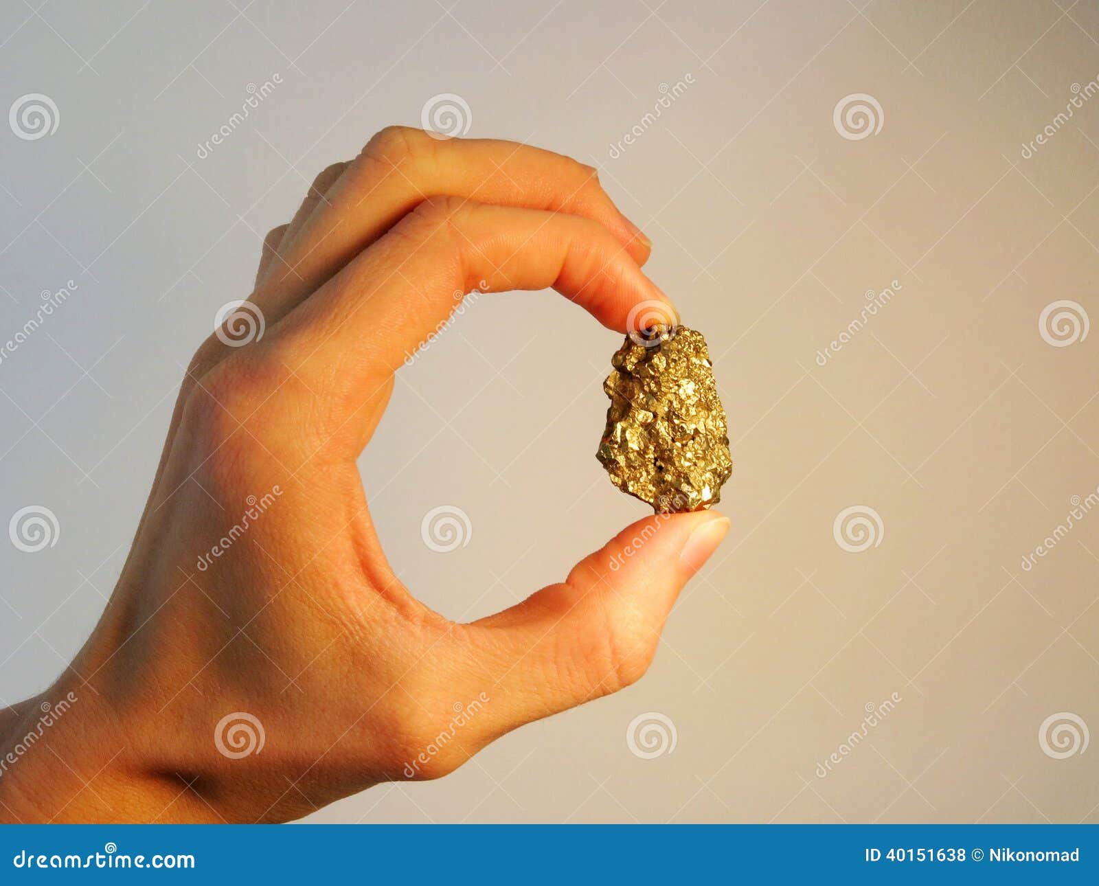 Hand Holding Gold Nugget stock photo. Image of hand, mining - 40151638
