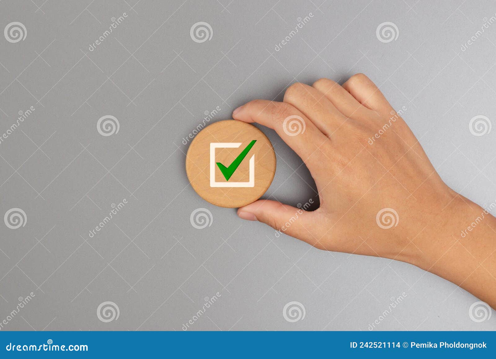 Hand Holding Green Checkmark Icon Symbol on Wooden Block Stock Photo ...