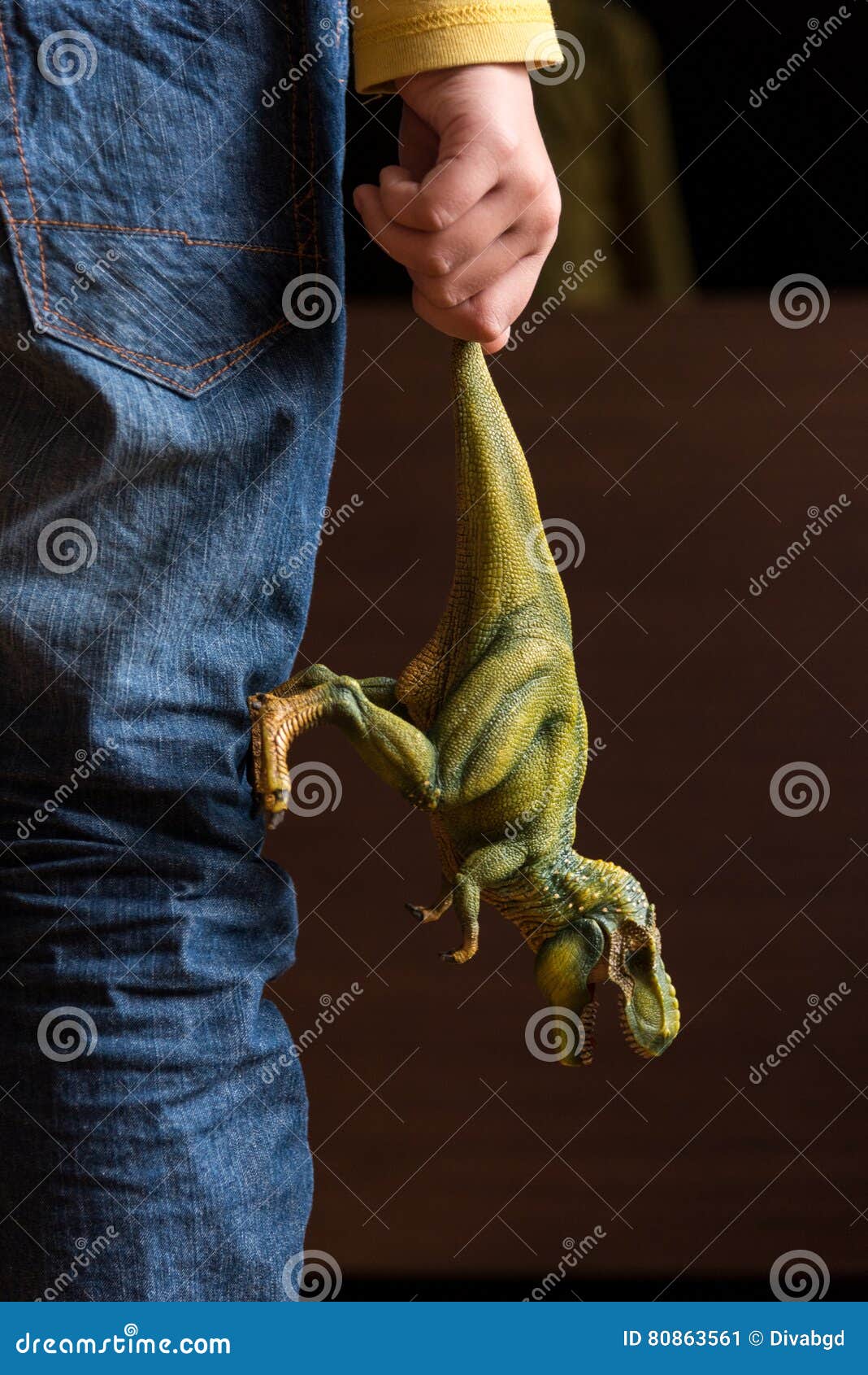 Hand Holding Green Dinosaur Stock Image - Image of dinosaur, ancient ...
