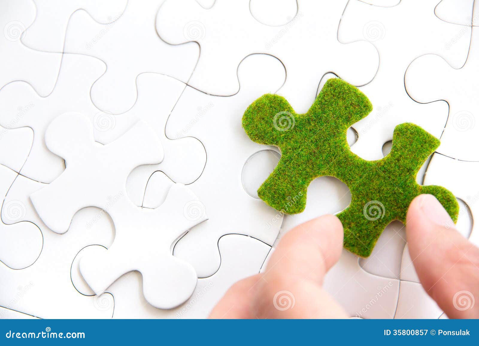 Hand Holding a Green Puzzle Piece Stock Image - Image of conceptual ...