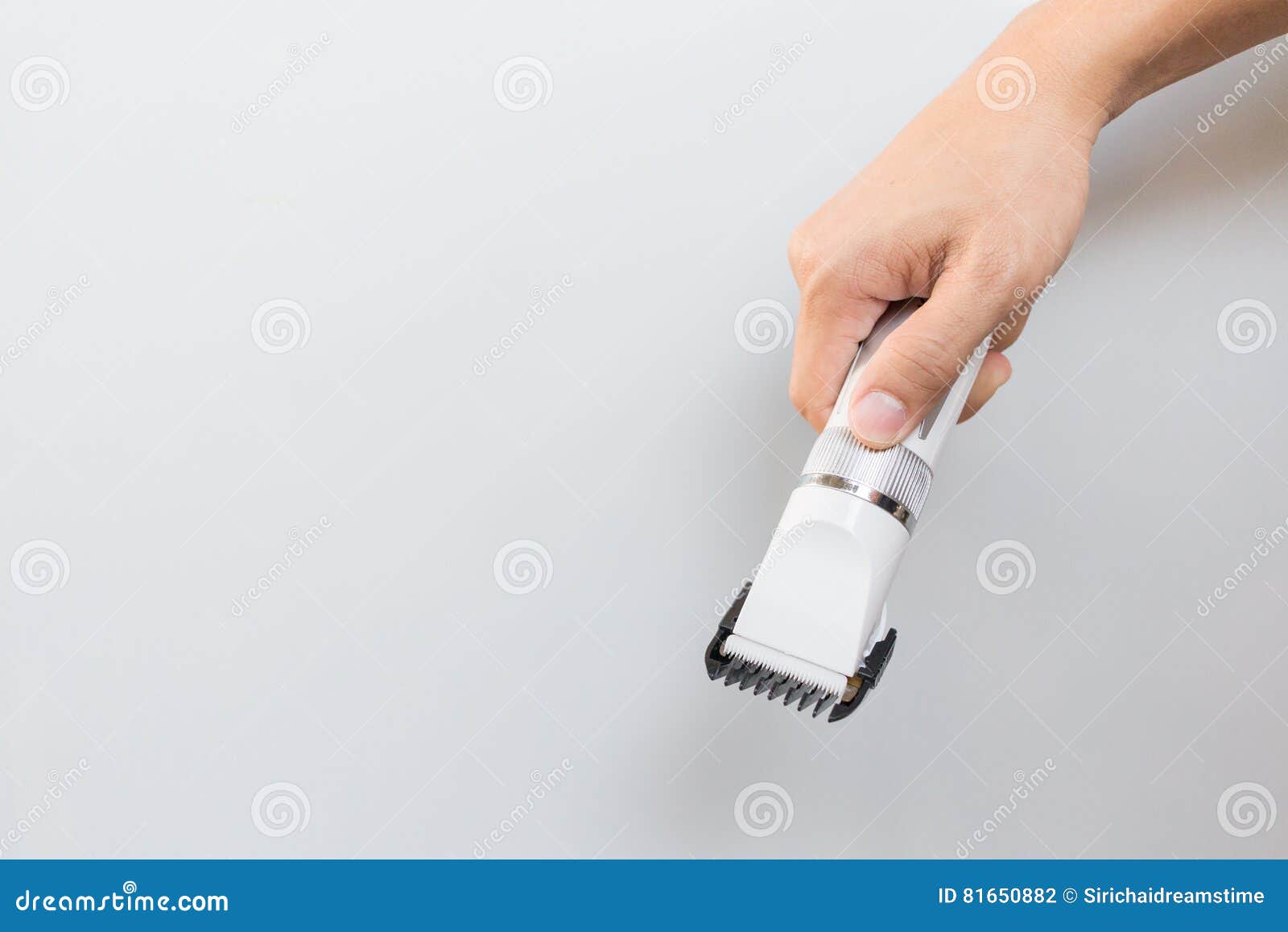 Hand Holding Hair Clippers Stock Photography | CartoonDealer.com #81650882