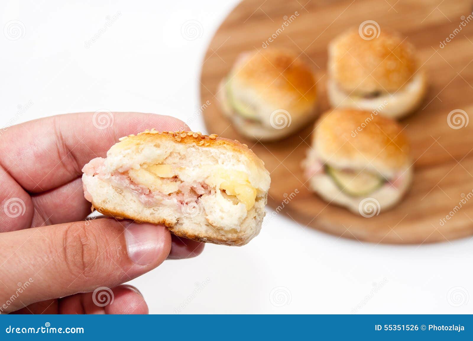 Hand Holding Hamburger Sandwiches Stock Photo - Image of cucumber ...