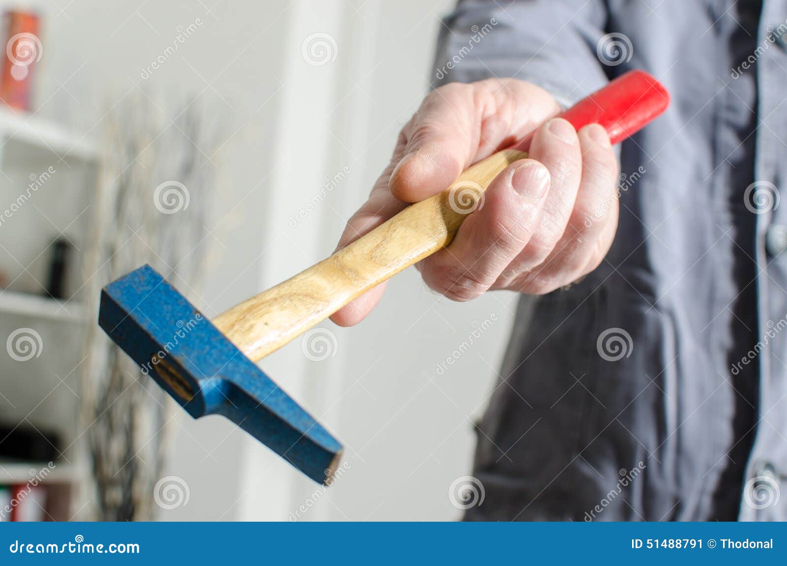 Hand holding a hammer stock image. Image of worker, metal - 51488791