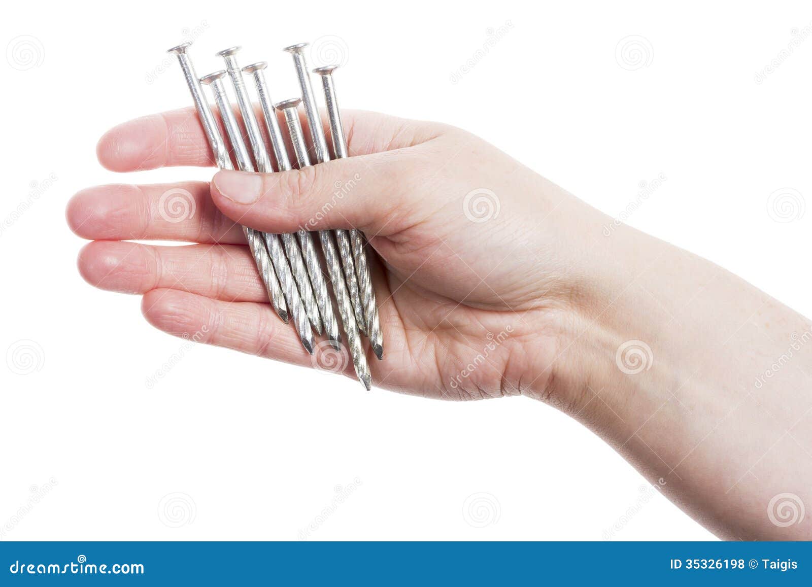 Hand Holding Handful of Nails Stock Photo - Image of home, hobby: 35326198