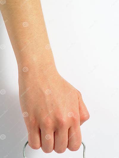 Hand holding a handle stock photo. Image of forearm, holding - 7033656