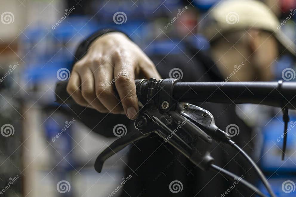 Hand Holding the Handlebars of a Bicycle Stock Image - Image of ...