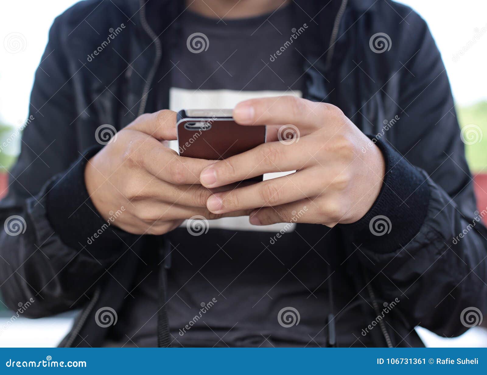 Hand holding handphone stock image. Image of finger - 106731361