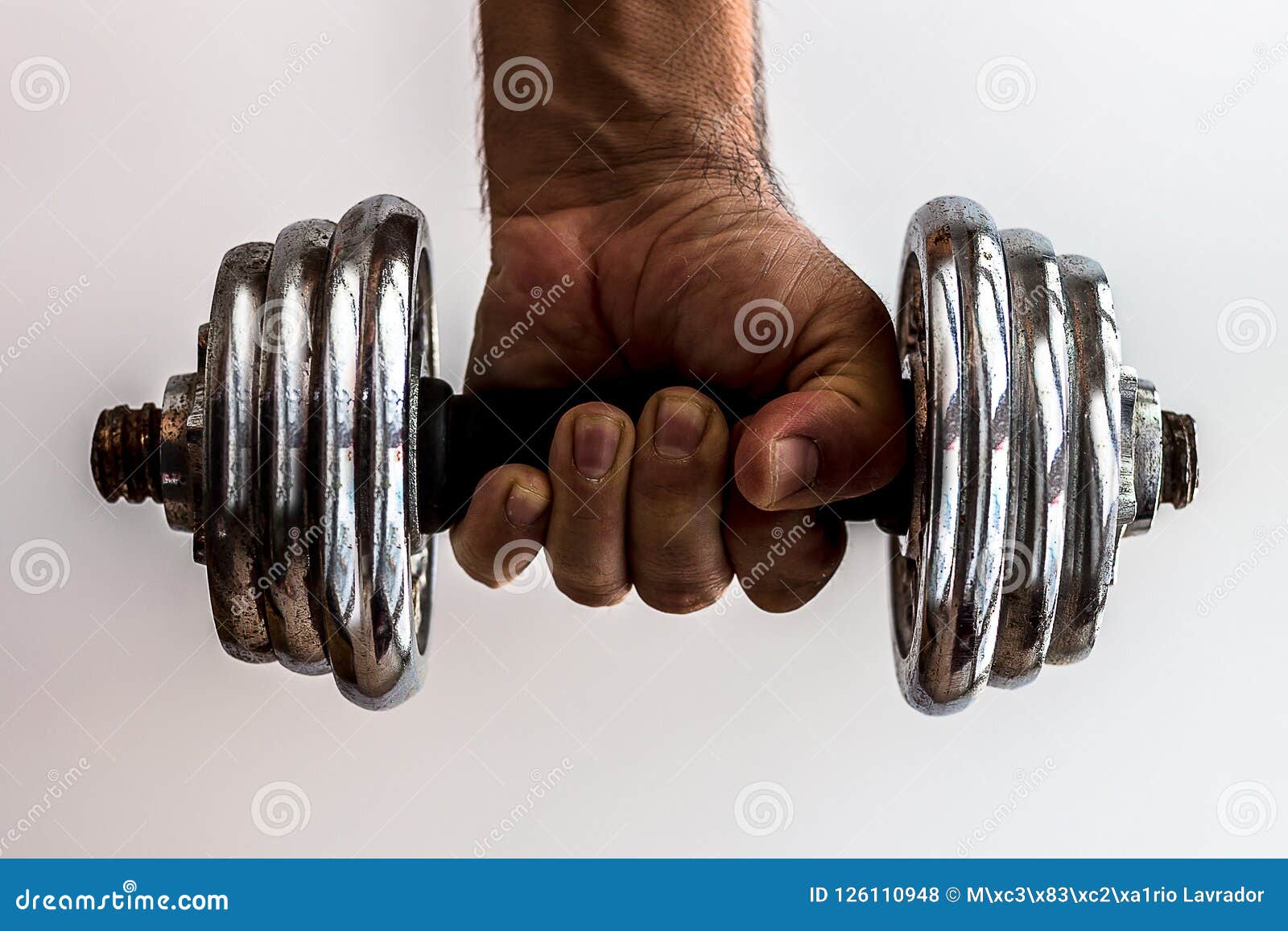 Hand Holding Dumbbells stock photo. Image of dumbbell - 126110948