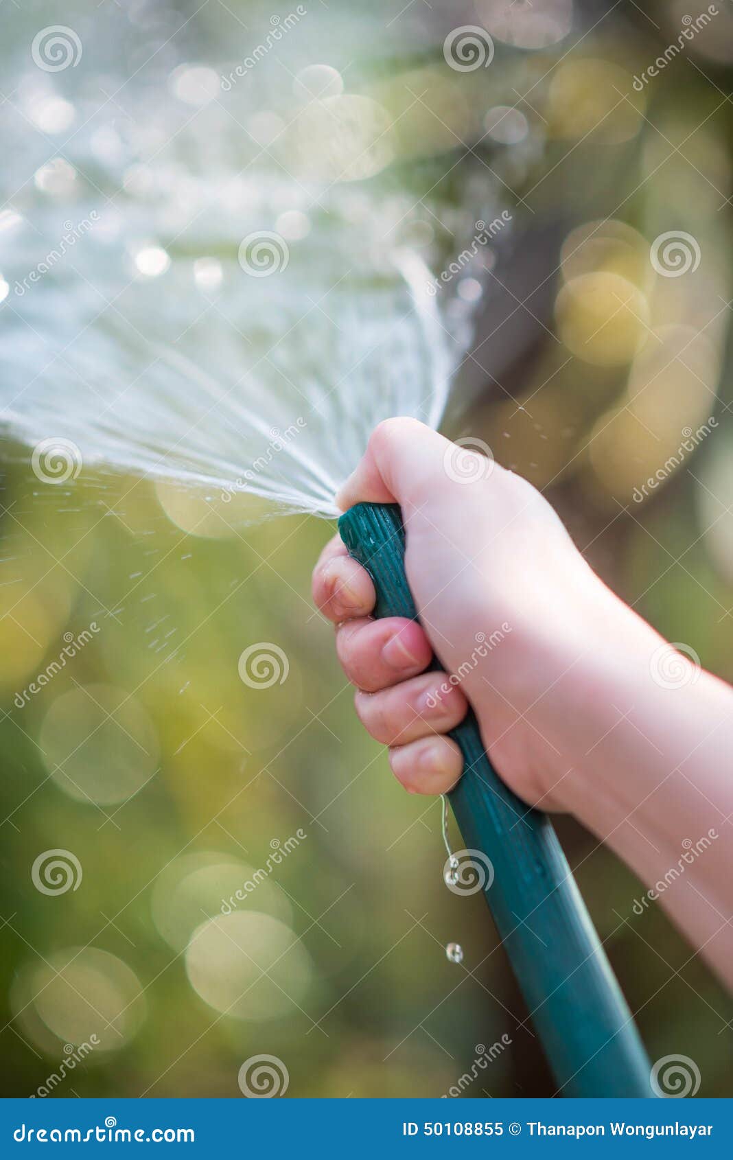 Hand holding a hose no5 stock image. Image of wash, hand - 50108855