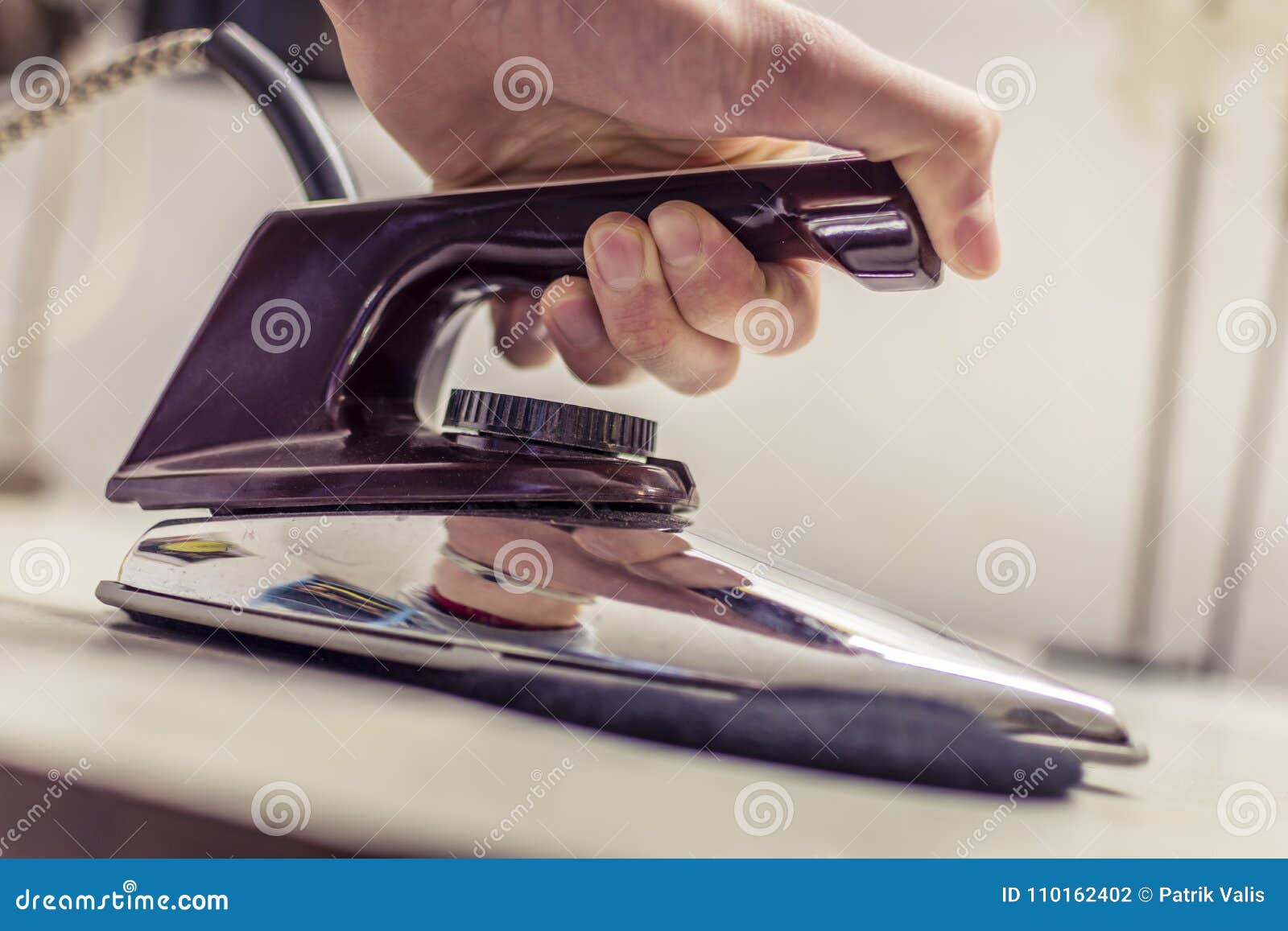 Hand Holding an Iron while Ironing. Stock Photo - Image of cloth, human ...