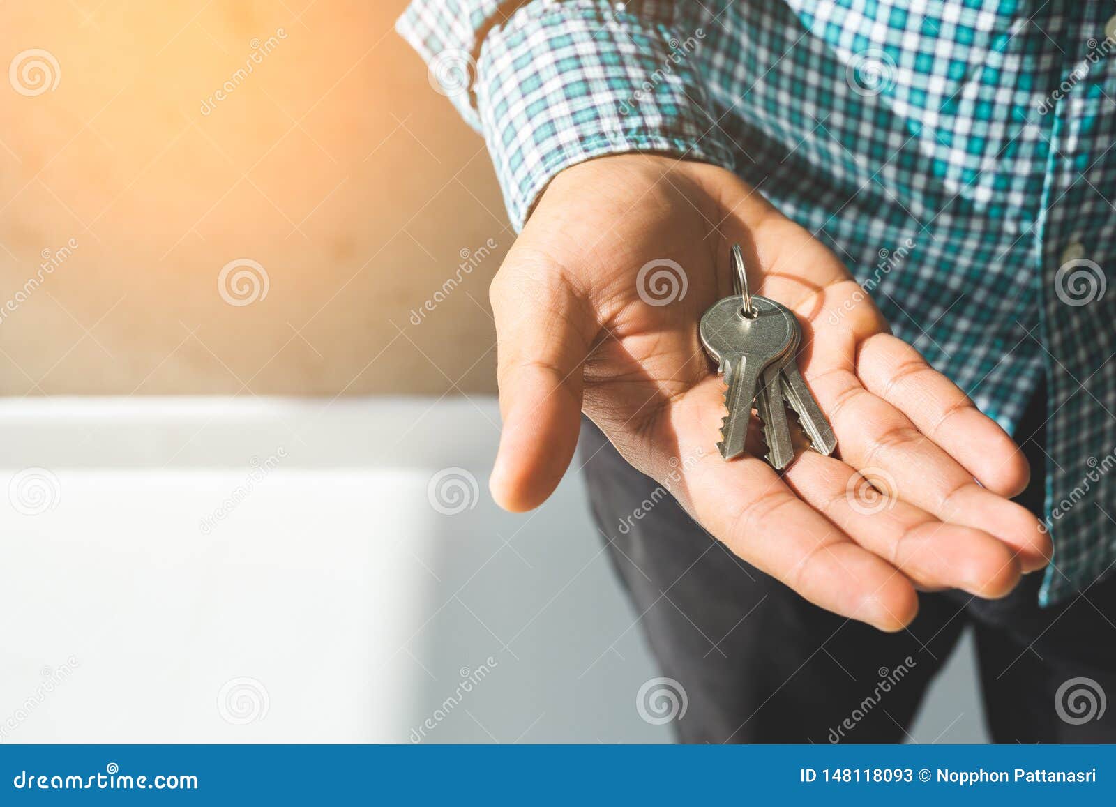 Close Up Hand Holding Key in House. Stock Image - Image of estate ...