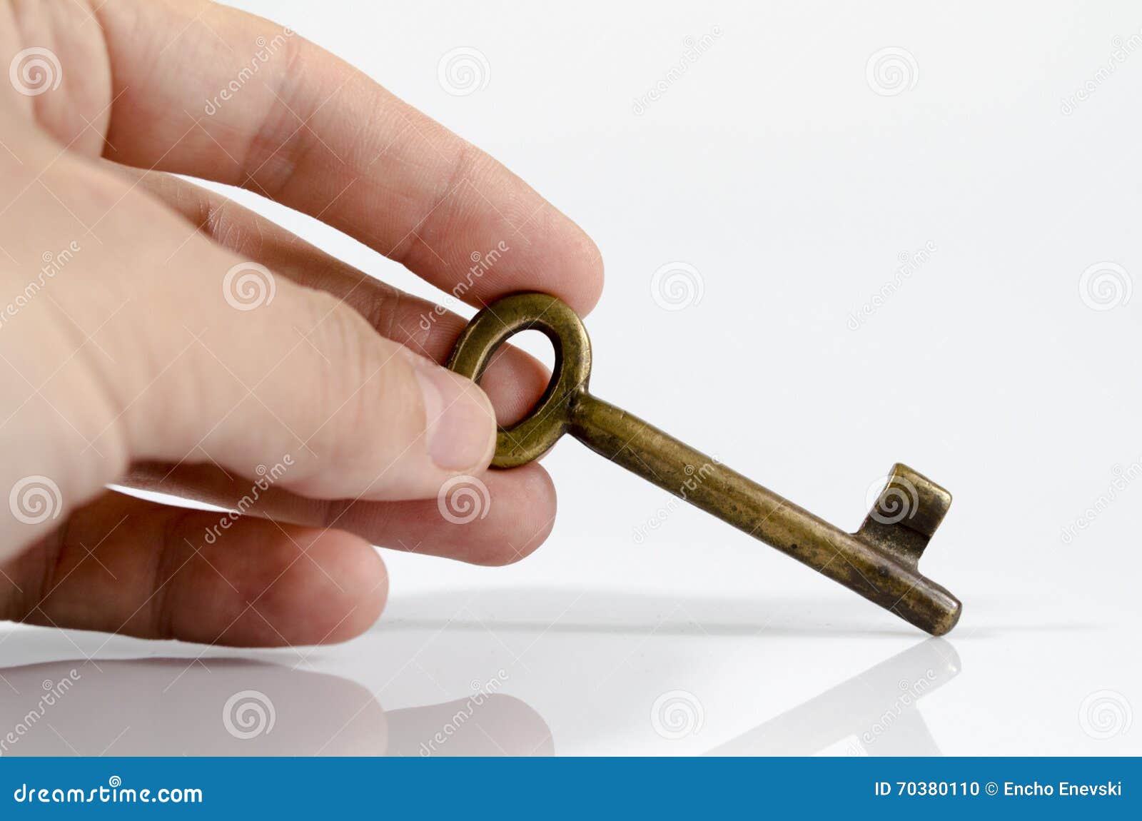 Hand holding key stock photo. Image of isolated, giving - 70380110