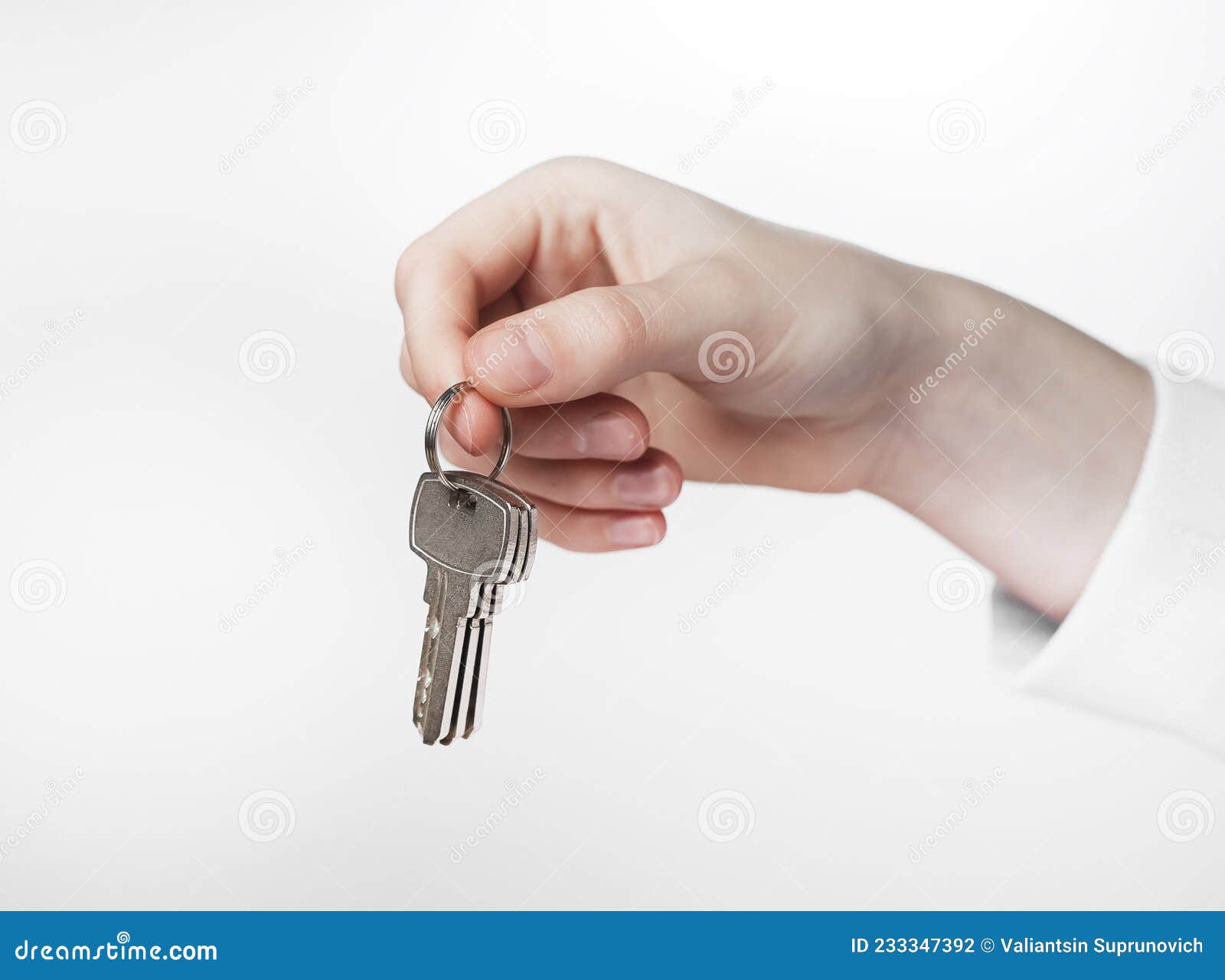Hand Holding Keys on Keyring Over White Background Stock Photo - Image ...