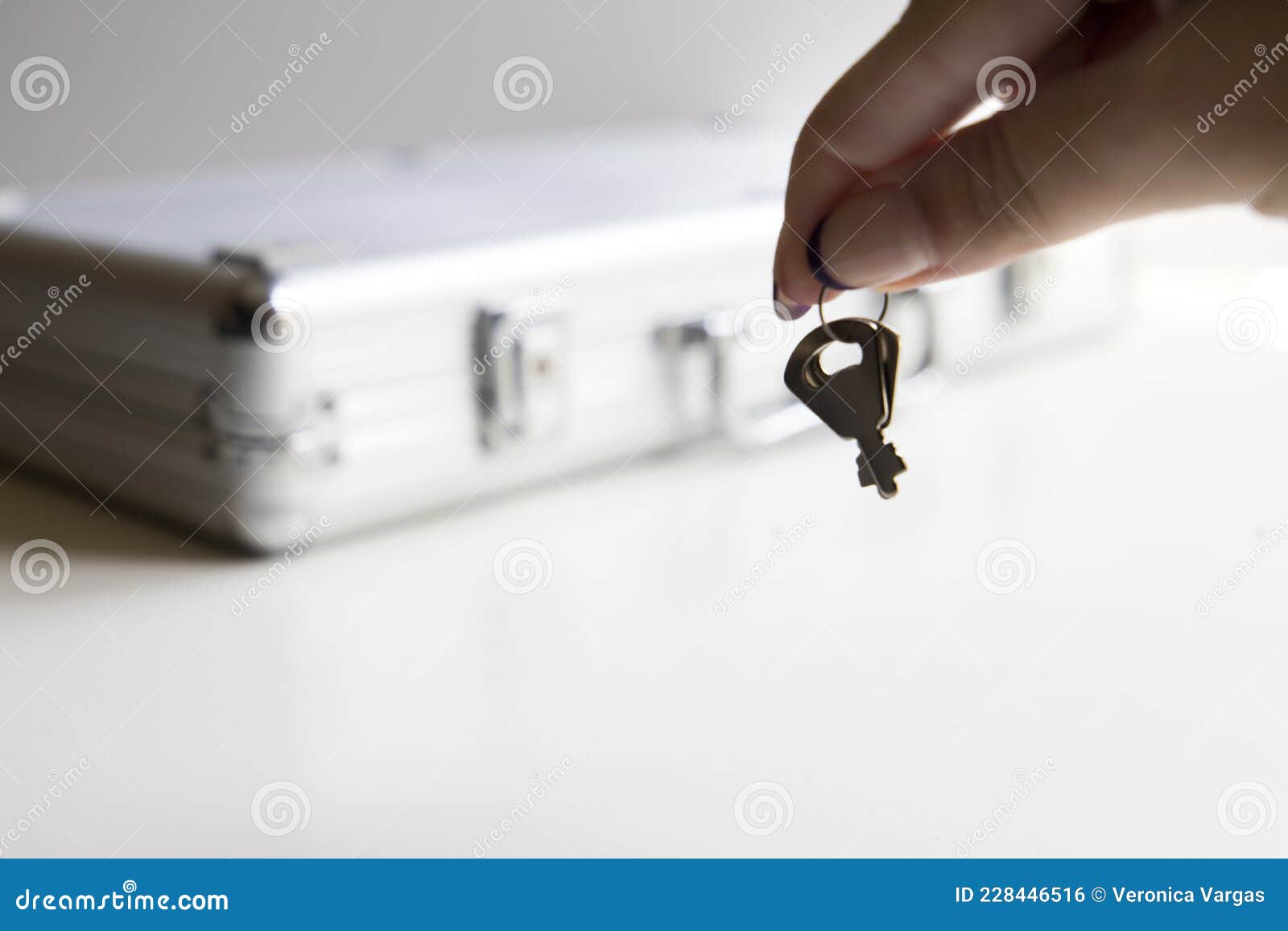 Hand Holding Keys that Open Briefcase Stock Photo - Image of luggage ...