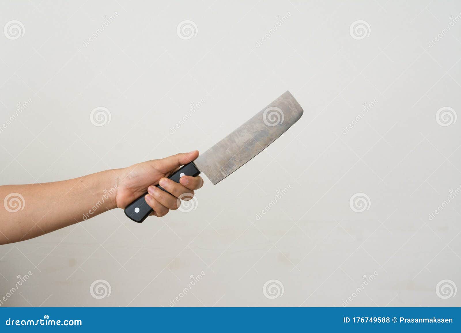 Hand holding a knife stock photo. Image of object, sharp - 176749588