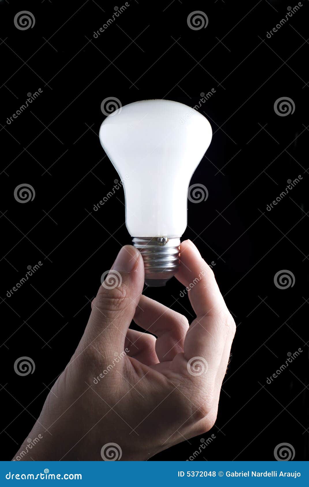 Hand holding lamp stock photo. Image of bright, light - 5372048