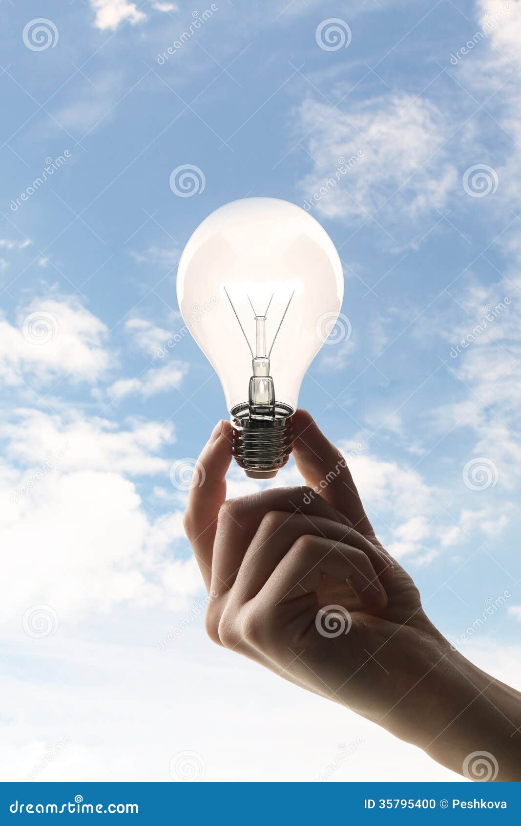 Hand holding lamp stock photo. Image of inspiration, color - 35795400