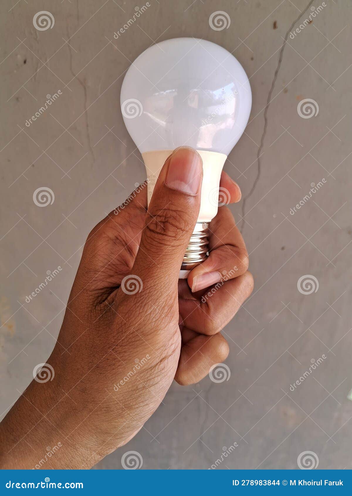 A Hand Holding a Led Lightbulb Stock Photo - Image of holding, hand ...