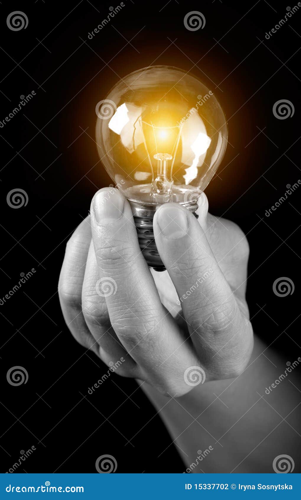 Hand holding light bulb stock photo. Image of good, inspiration - 15337702