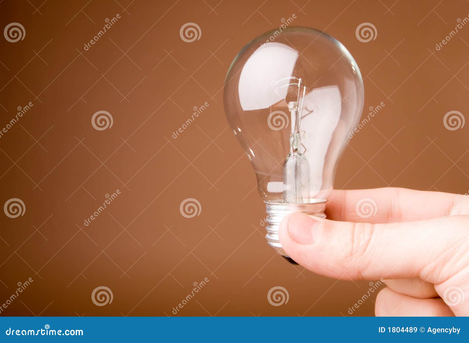 Hand holding light bulb stock image. Image of beige, invention - 1804489