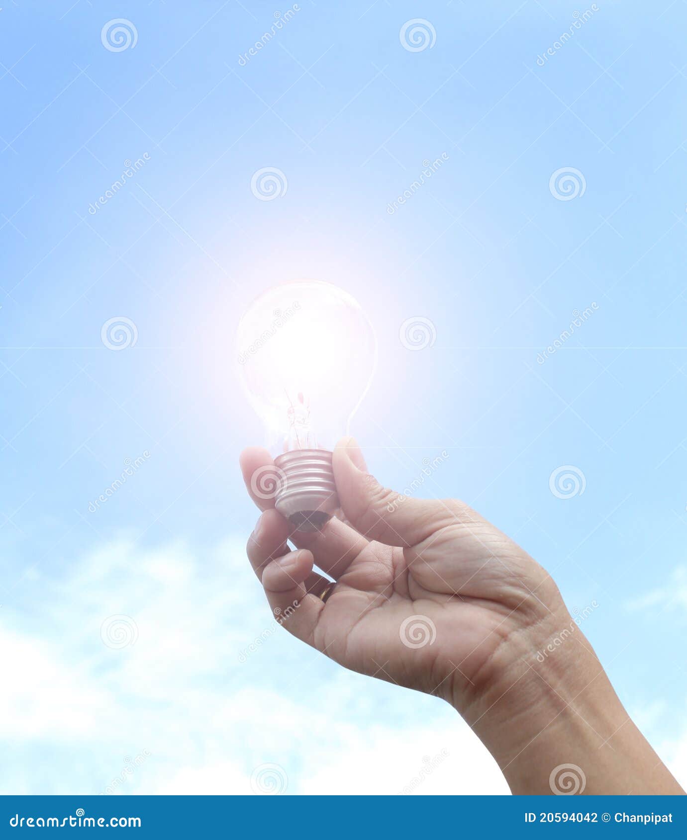 Hand holding light bulb stock photo. Image of discovery - 20594042