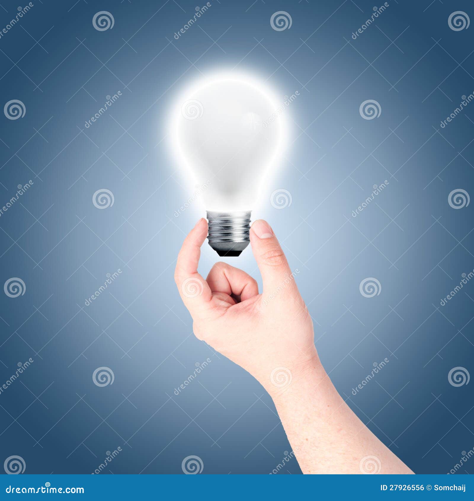 Hand holding light bulb stock photo. Image of glowing - 27926556