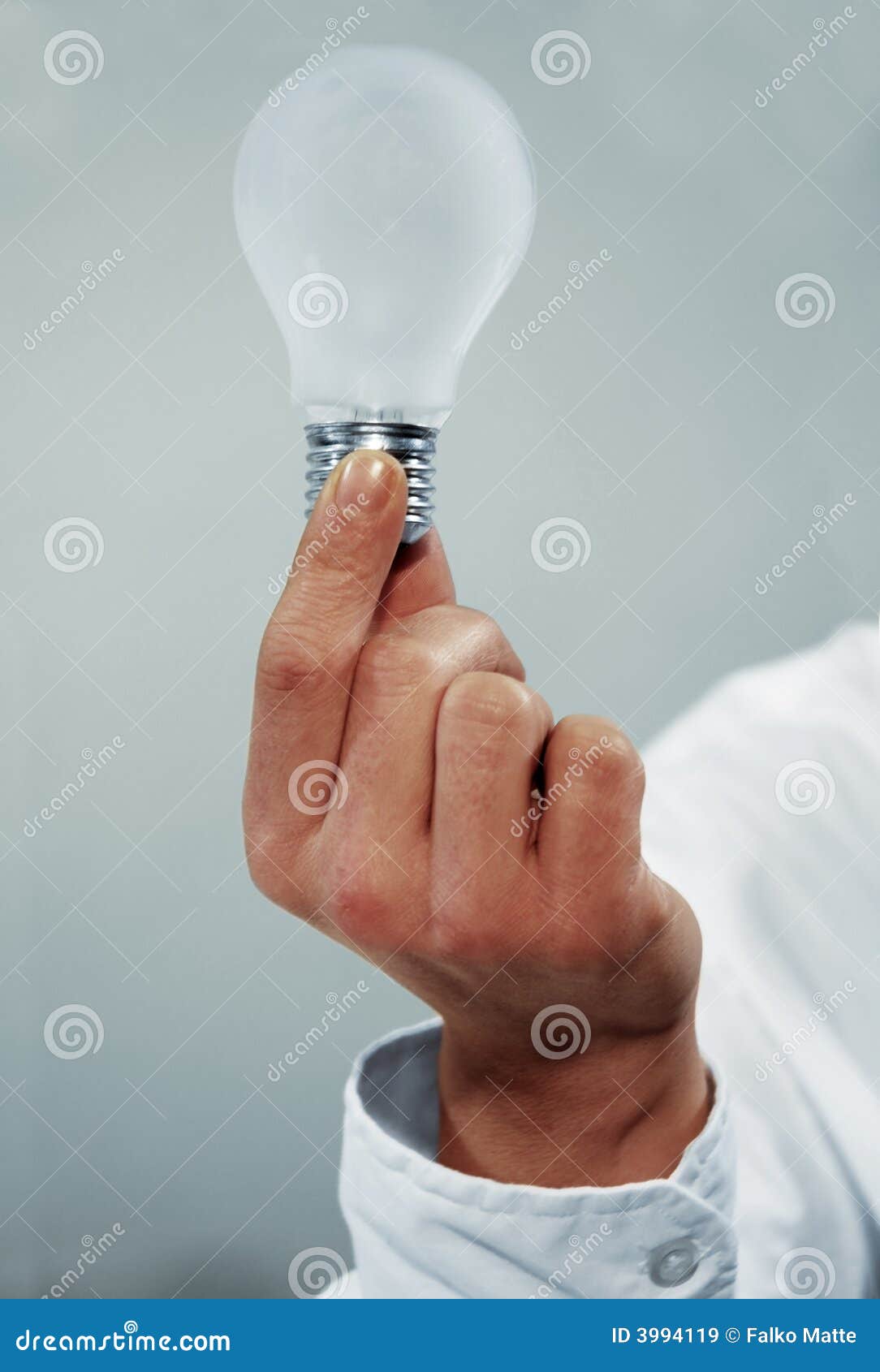 Hand holding light bulb stock image. Image of electricity - 3994119