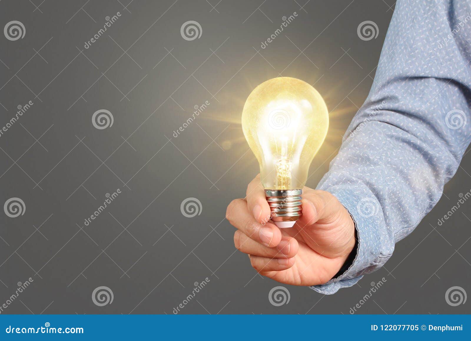 Hand Holding Light Bulb with Energy Stock Image - Image of lightbulb ...