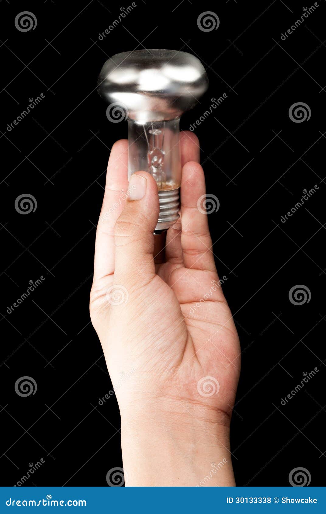 Hand Holding a Light Bulb, Isolated Dark Stock Photo - Image of green ...