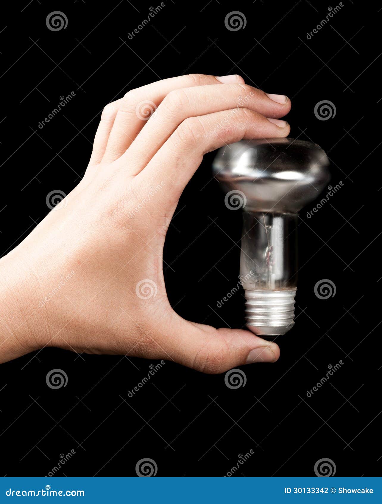Hand Holding a Light Bulb, Isolated Dark Stock Photo - Image of ...