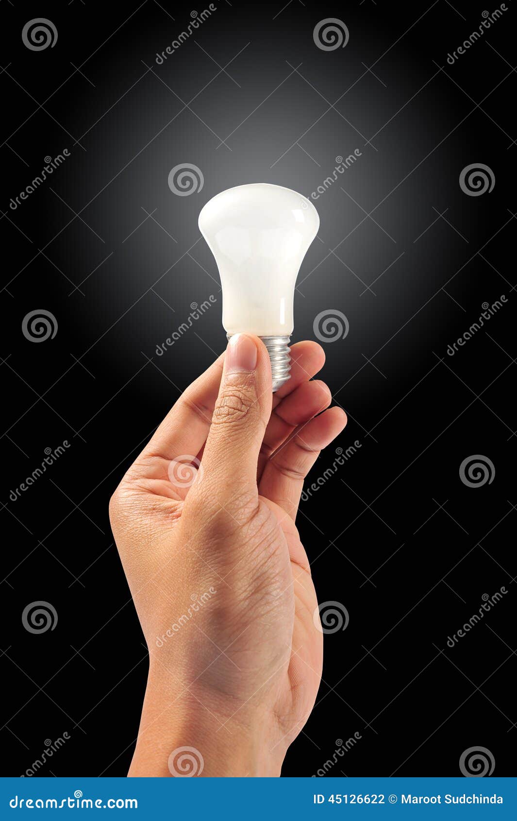 Hand holding a light bulb stock photo. Image of intelligent - 45126622