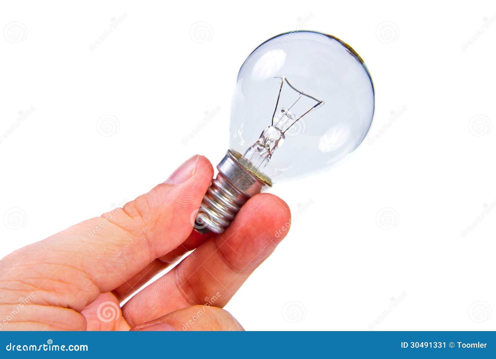 Hand holding a light bulb stock image. Image of skin - 30491331