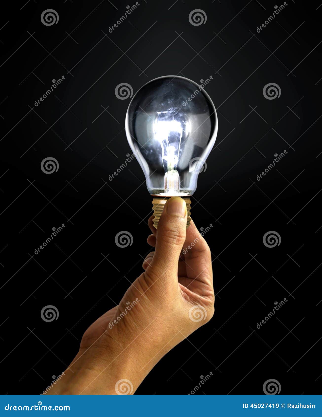 Hand Holding Light Bulb stock image. Image of background - 45027419
