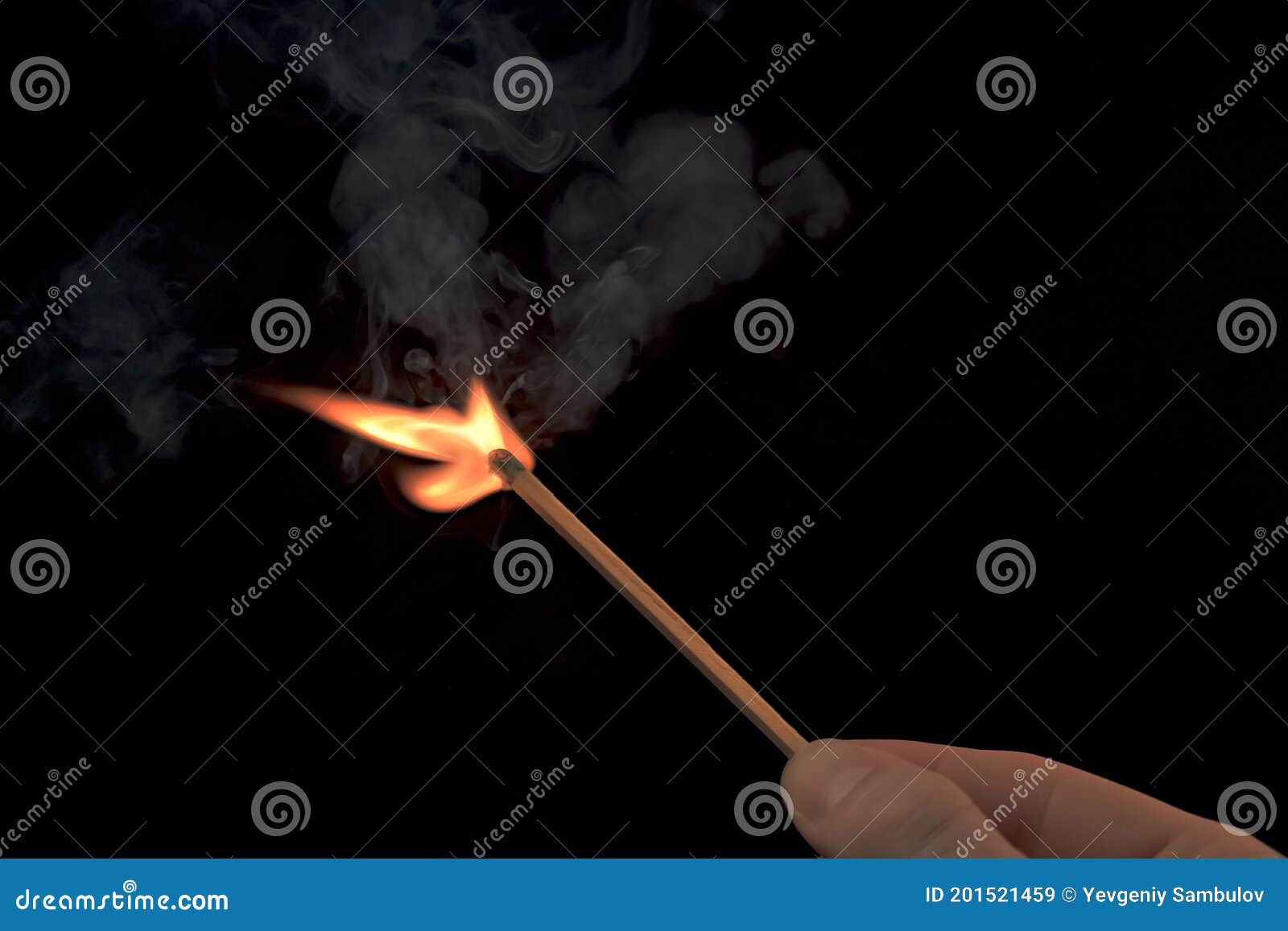 Lighted Match In A Woman`s Hand And A Fire Alarm On A Blue Background ...